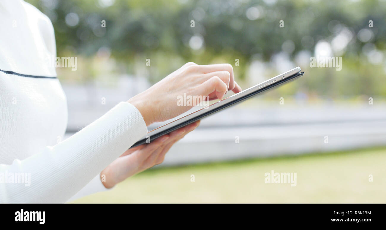 Woman use of tablet Stock Photo - Alamy