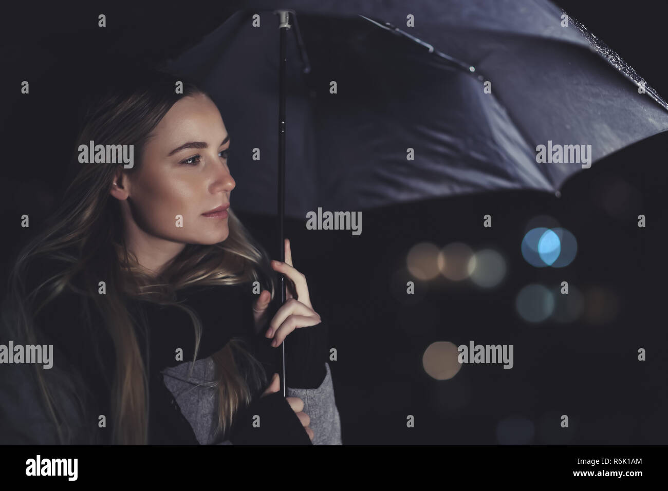 Beautiful woman under the rain Stock Photo - Alamy
