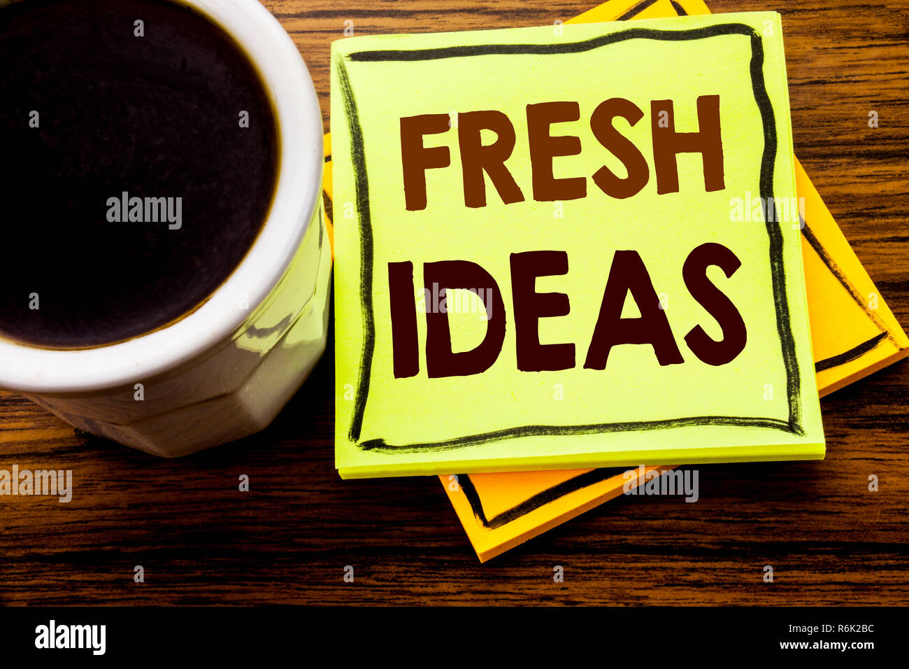 Handwritten text showing Fresh Ideas. Business concept for Thinking ...