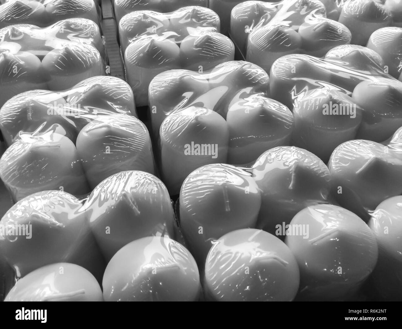 Candles in plastic wrap Stock Photo - Alamy