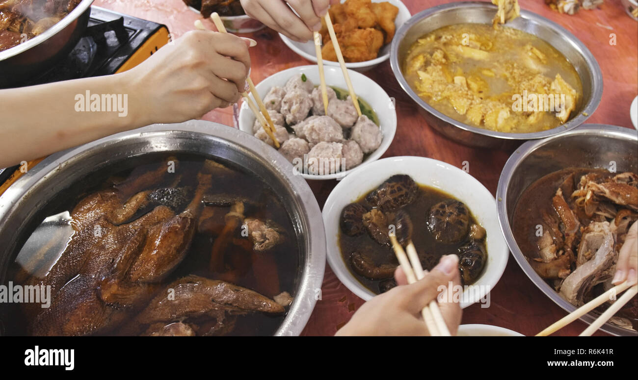 Family eating together Stock Photo - Alamy