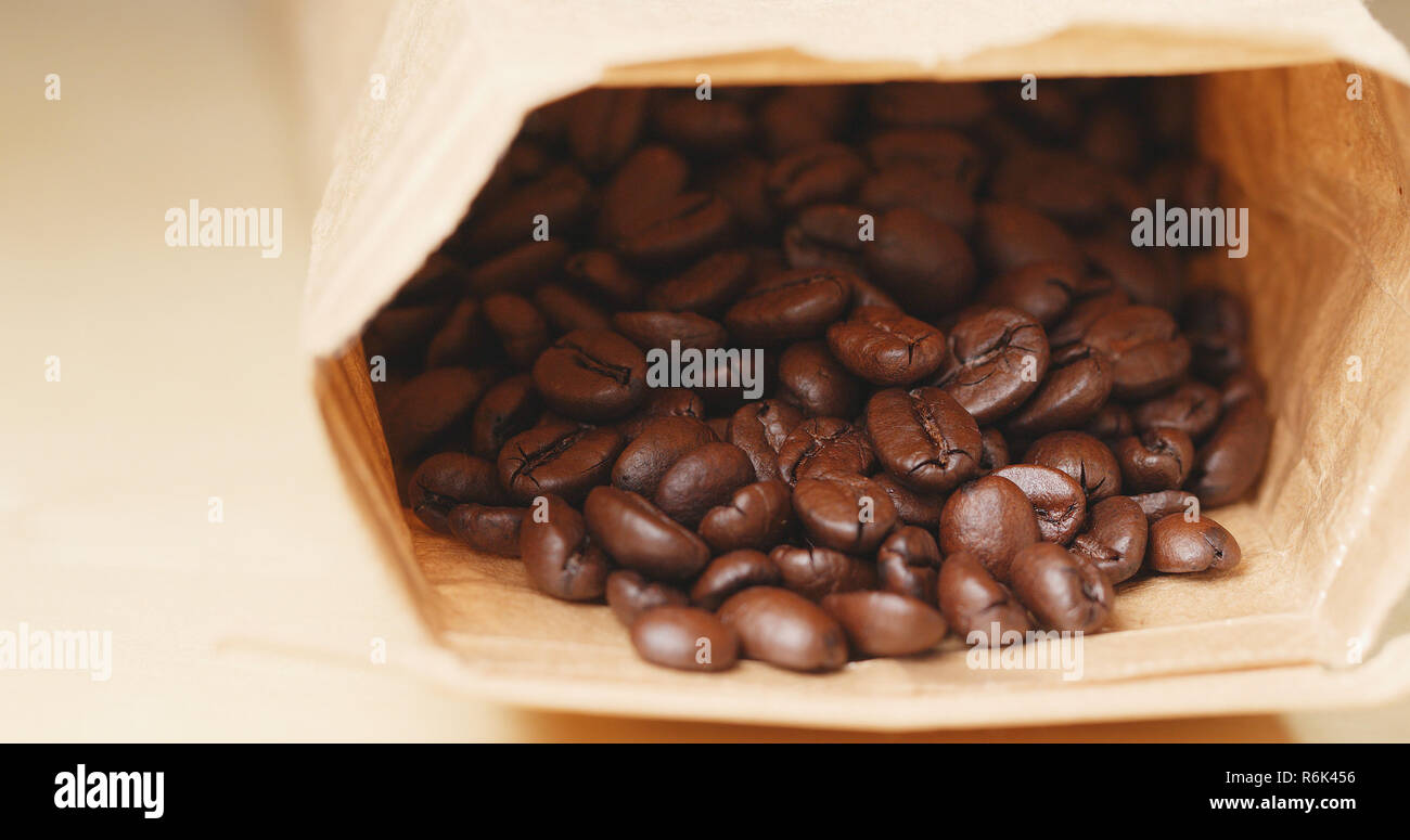 Coffee bean inside bag Stock Photo - Alamy
