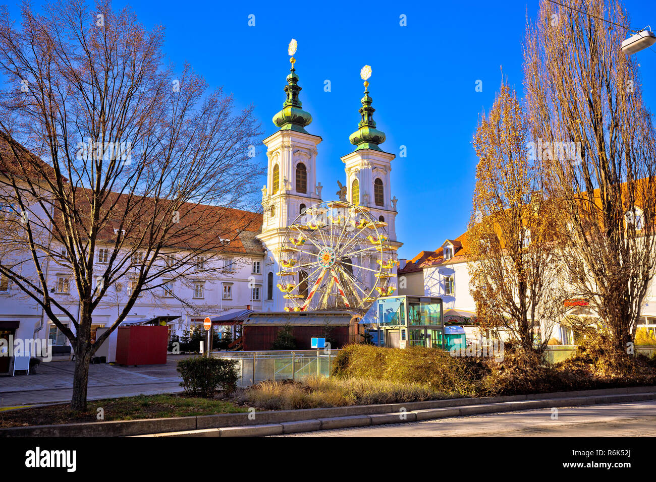 Mur river coast and church in Graz view Stock Photo - Alamy