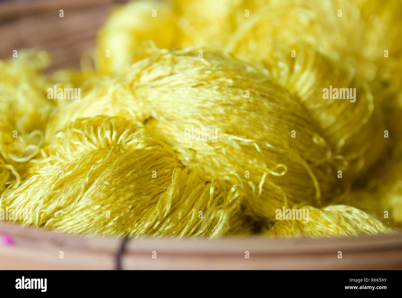 Threads silk golden color Stock Photo - Alamy