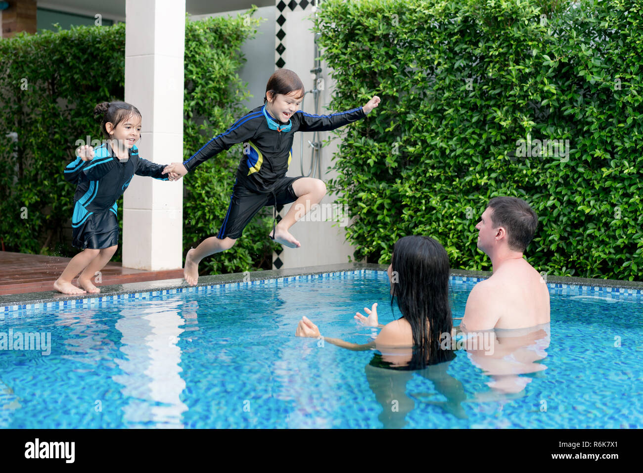 Kids Pool Jump High Resolution Stock Photography and Images - Alamy