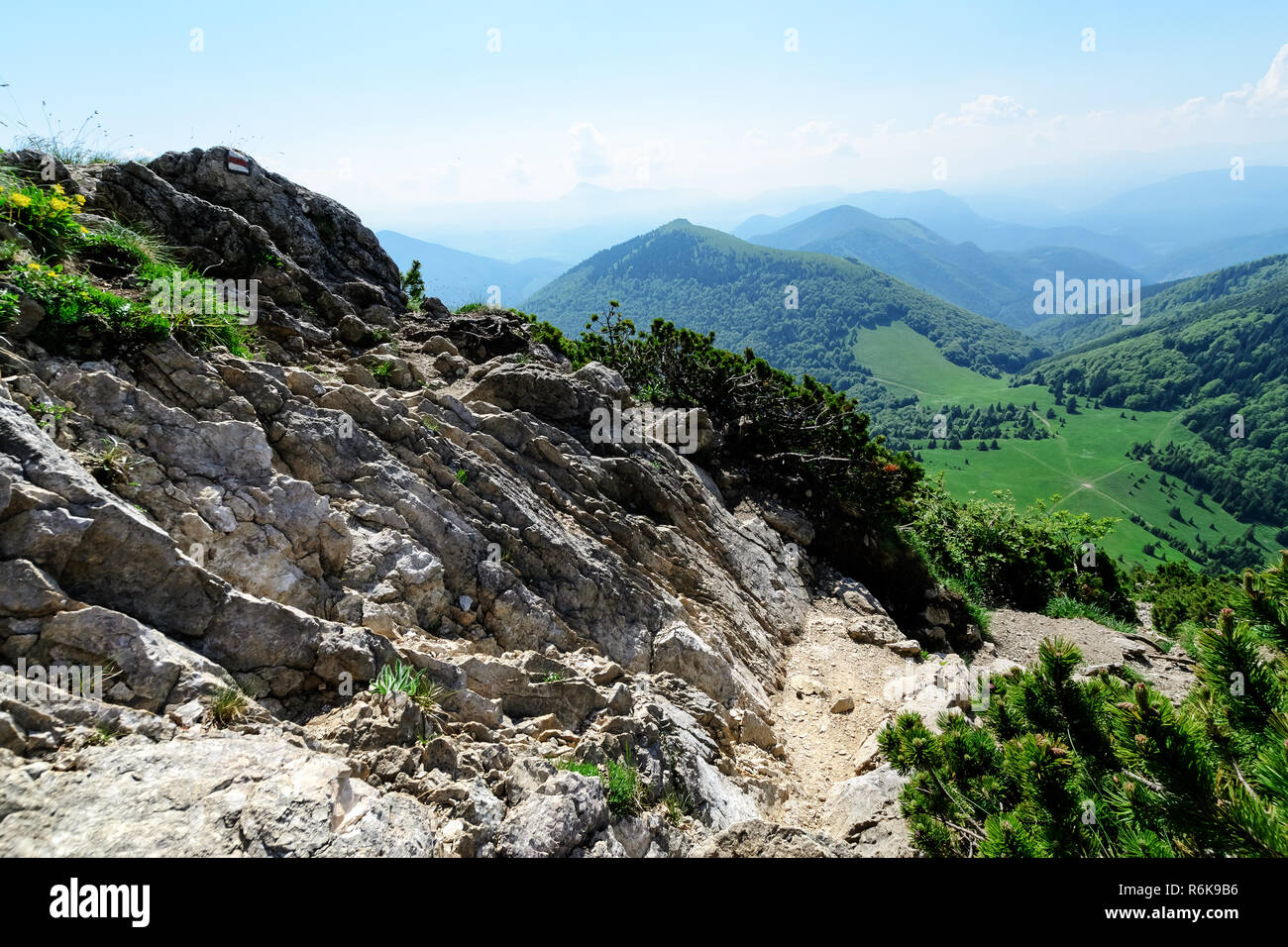The rocky slope with view on cross paths in Vratna valley at the ...