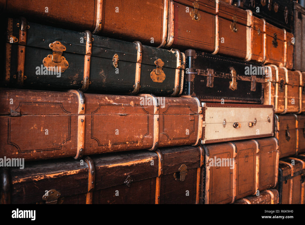 Old vintage suitcases standing in a stack. Vintage background Stock ...