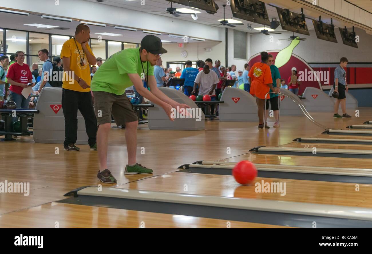 Special Olympics athletes bowl during the Special Olympics Mississippi ...
