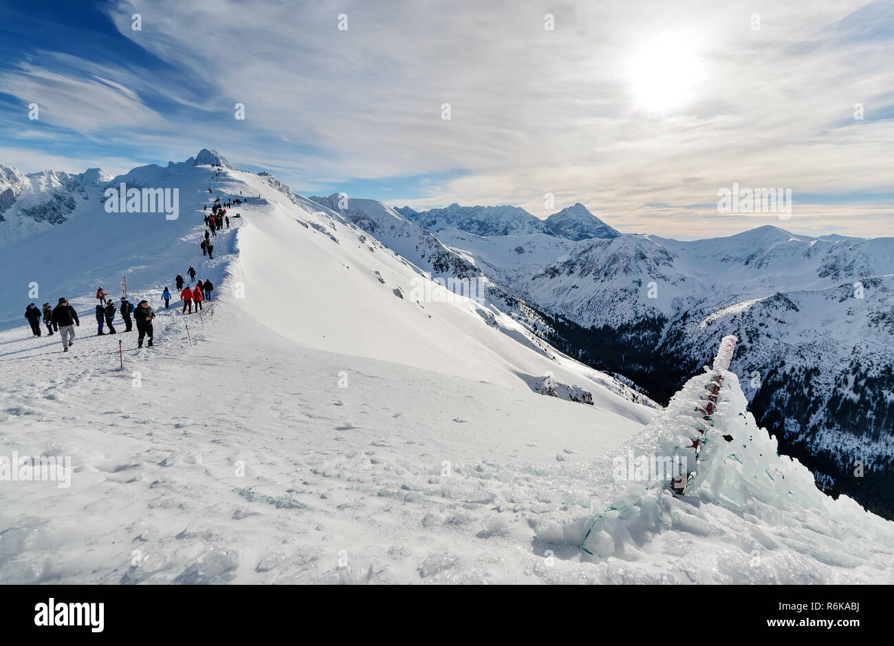Tourists walk in snow-covered high Tatras. Poland Stock Photo - Alamy