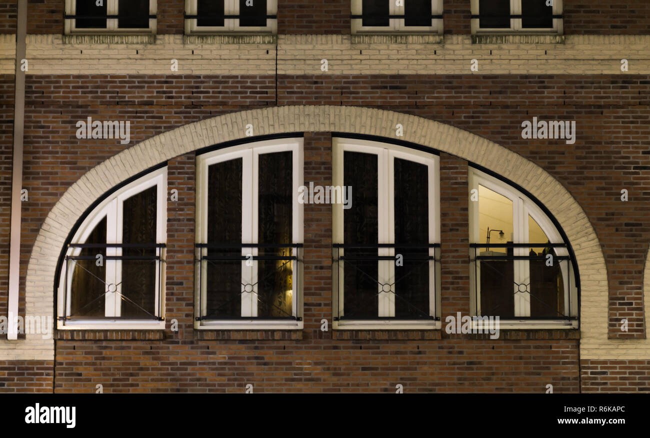 beautiful city windows next to each other under a arch, modern dutch ...