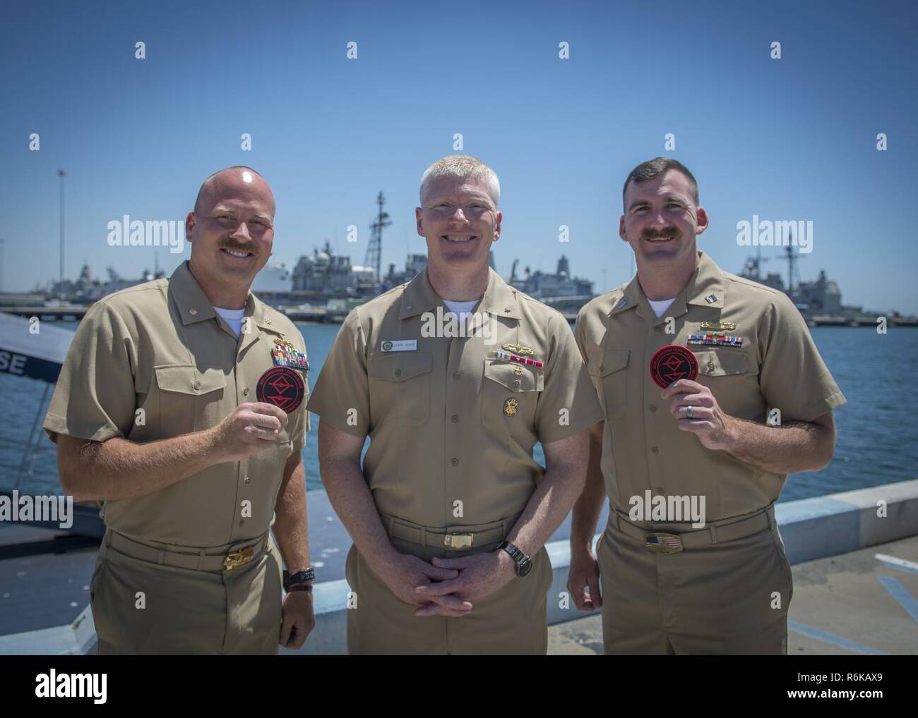 Rear Adm. John Wade (middle), commander, Naval Surface and Mine ...