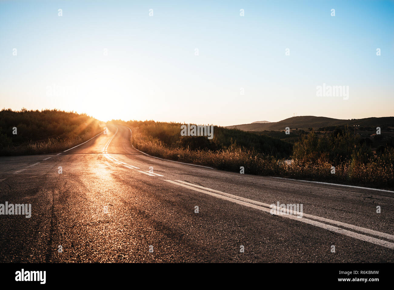 Winding asphalt road hi-res stock photography and images - Alamy