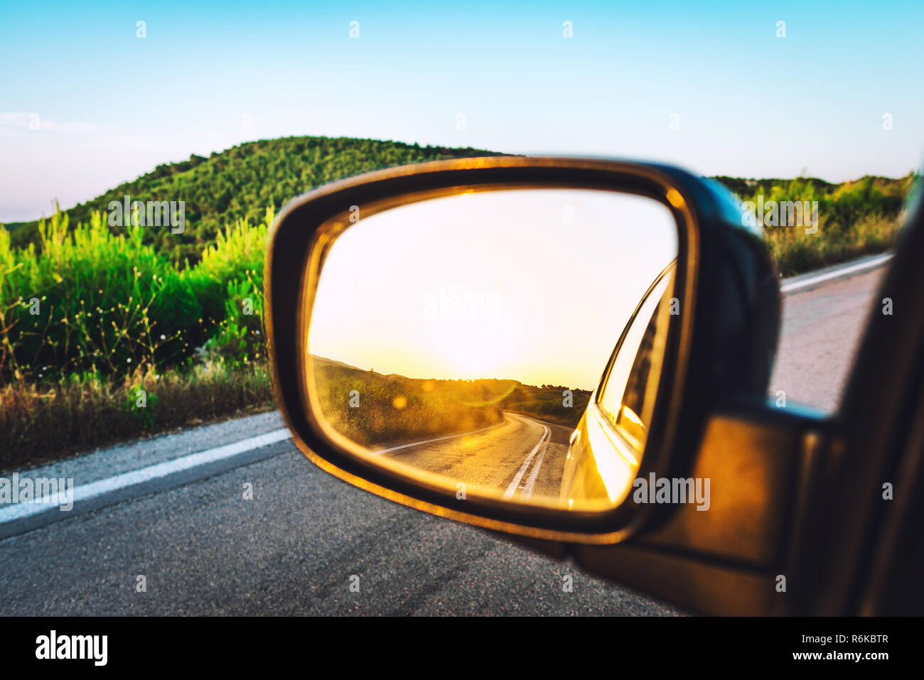 Side view mirror car sunset sky hi-res stock photography and images - Alamy