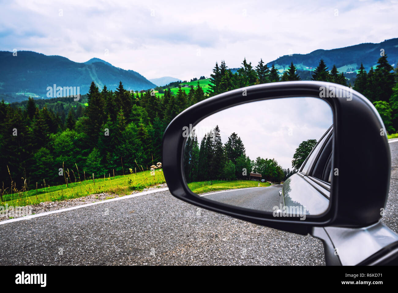 Beautiful landscape from car window on mountain road. Summer traveling ...
