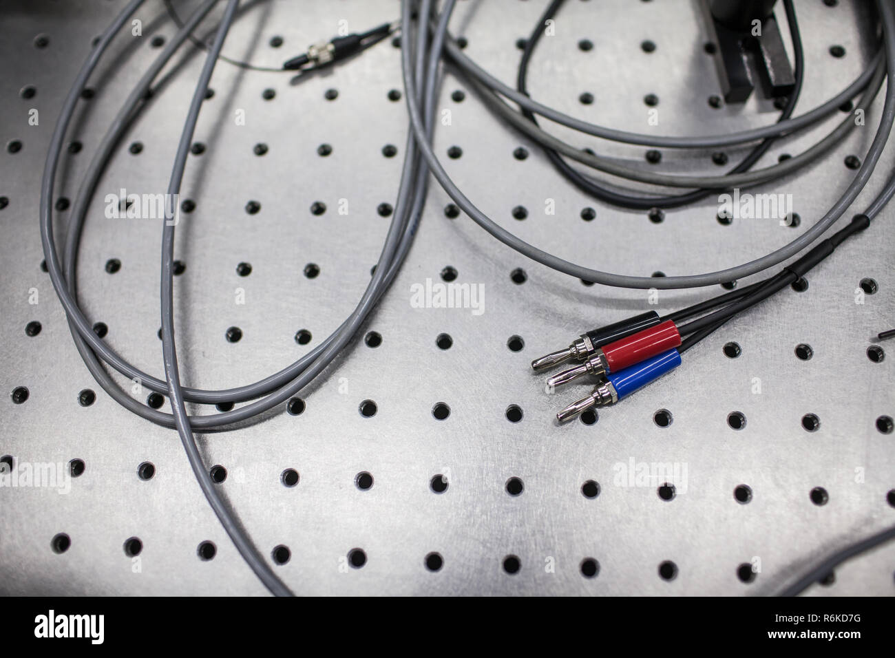 Digital oscilloscope is used by an experienced electronic engineer in ...