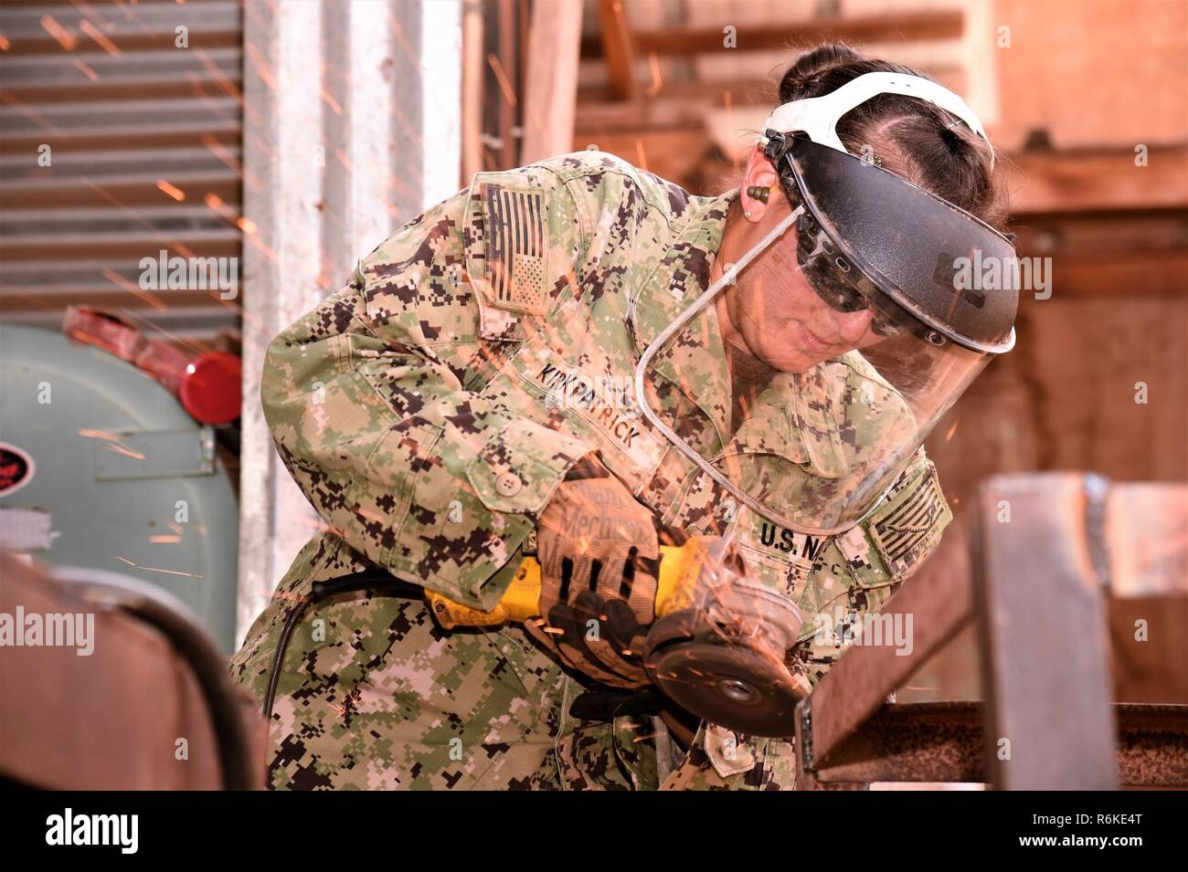 U.S. Navy Petty Officer 3rd Class Katelyn Kirkpatrick, a Naval Mobile ...