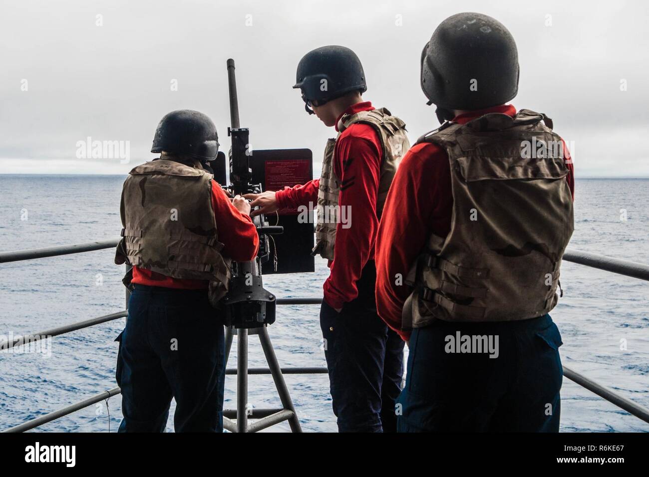 WATERS SOUTH OF JAPAN (May 25, 2017) Sailors reload a .50-caliber ...