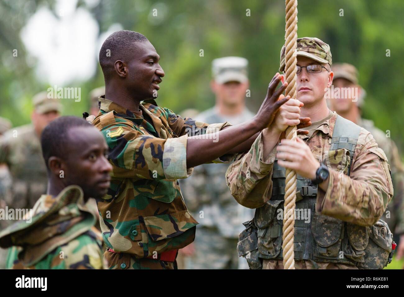 Ghanaian Armed Forces Cpl. Kingsley Anyeala explains rope climbing ...