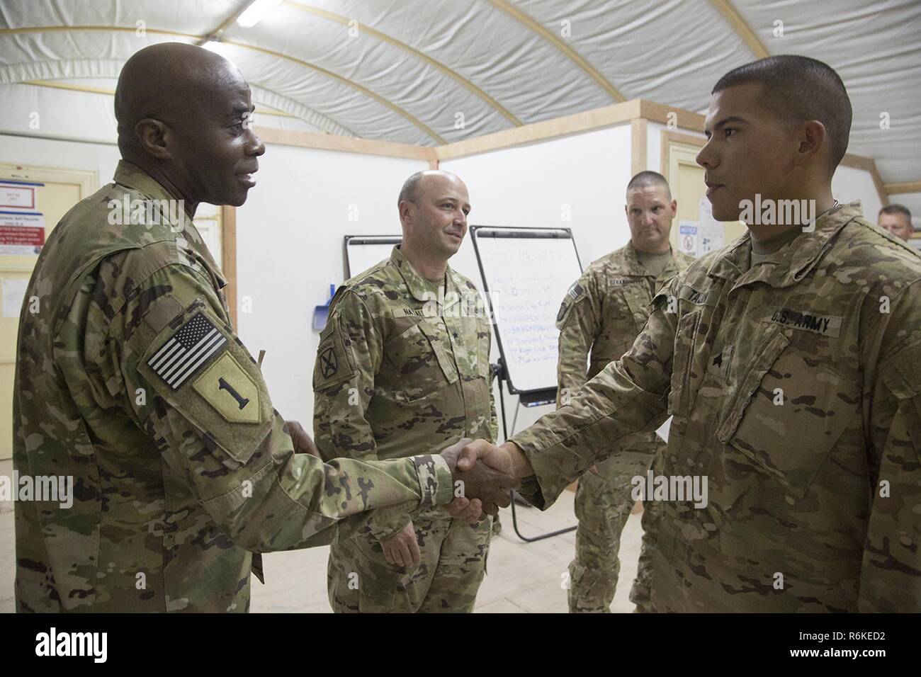 Command Sgt. Major Corey Cush, the command sergeant major of the 53rd Troop Command, and Brig ...