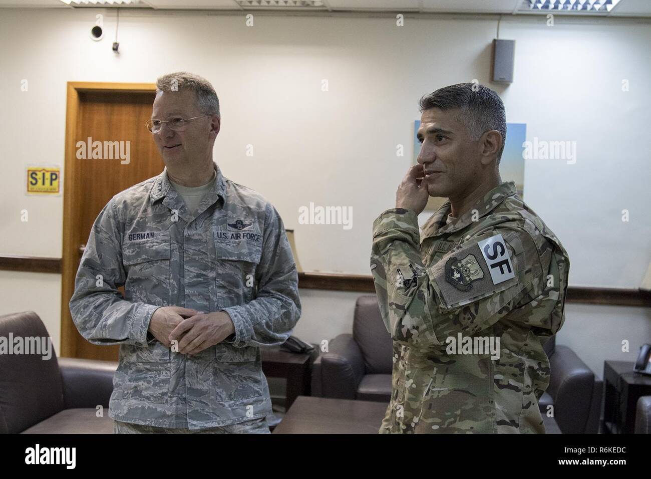 Major General Anthony German, Adjutant General of New York, speaks with ...