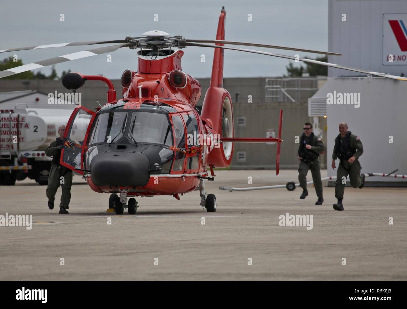 A U.S. Coast Guard HH-65C Dolphin helicopter crew from Coast Guard Air ...