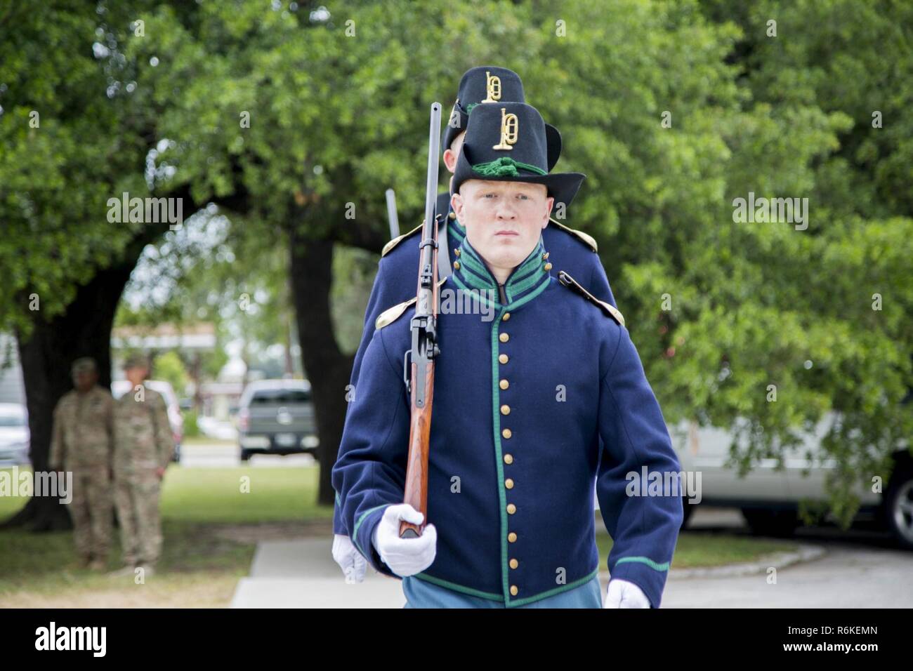 Staff Sgt. Justin Lindstrom leads the color guard during a wreath ...