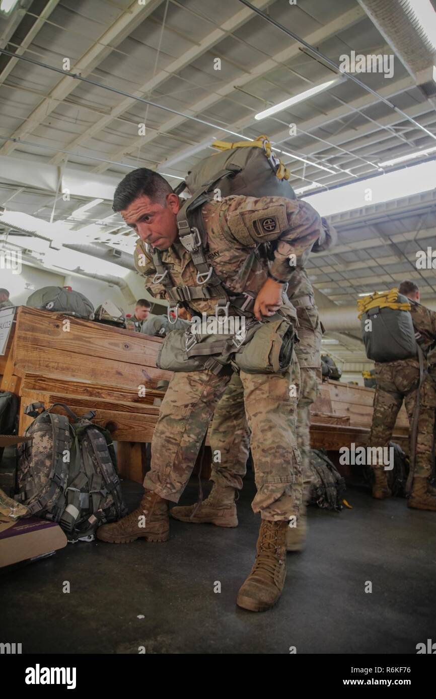 U.S. Army Spc. Joshua Manriquez assigned to the 1505th BCO prepares for ...
