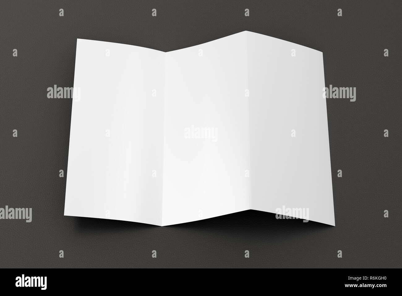 Blank trifold brochure A4 unfolded booklet on black background with ...