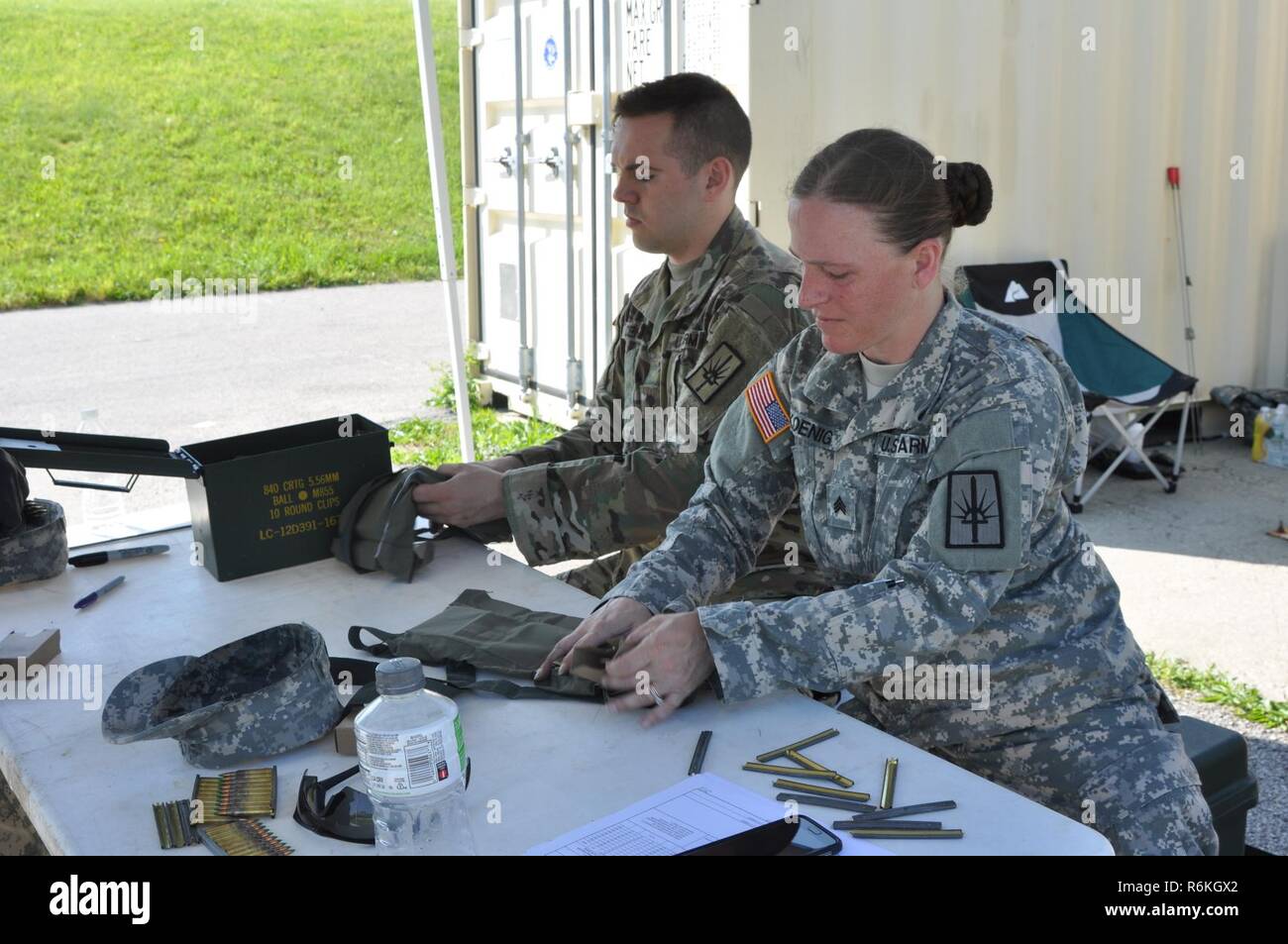 From the left, U.S. Army National Guard soldiers, Spc. Tyler Center and ...