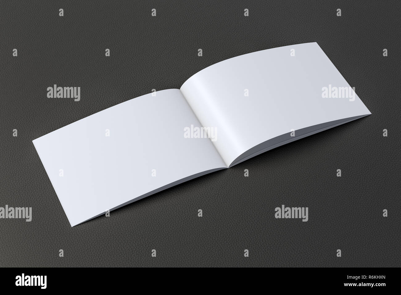 Open blank horizontal booklet on black background with clipping path ...