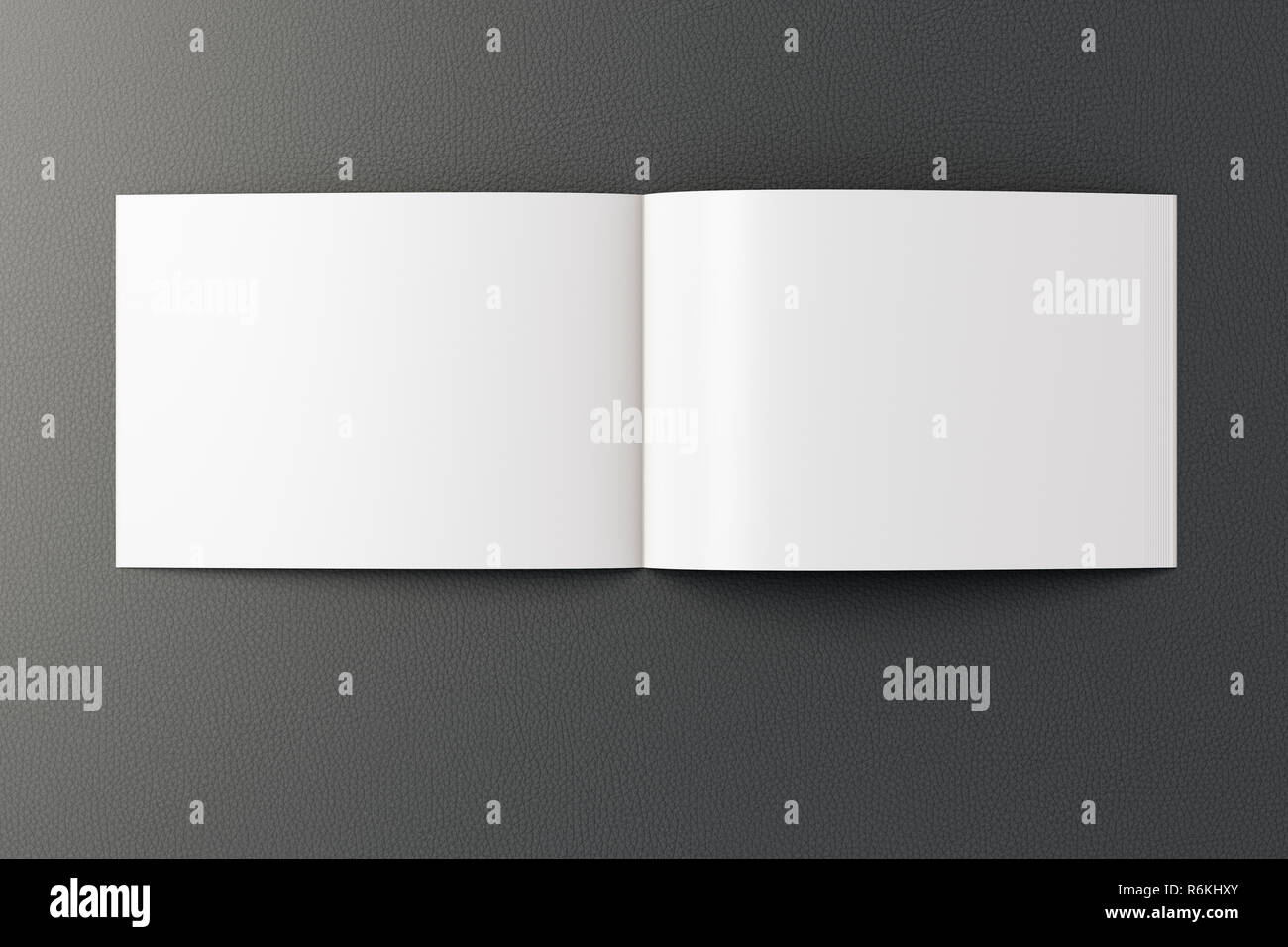 Open blank horizontal booklet on black background with clipping path ...