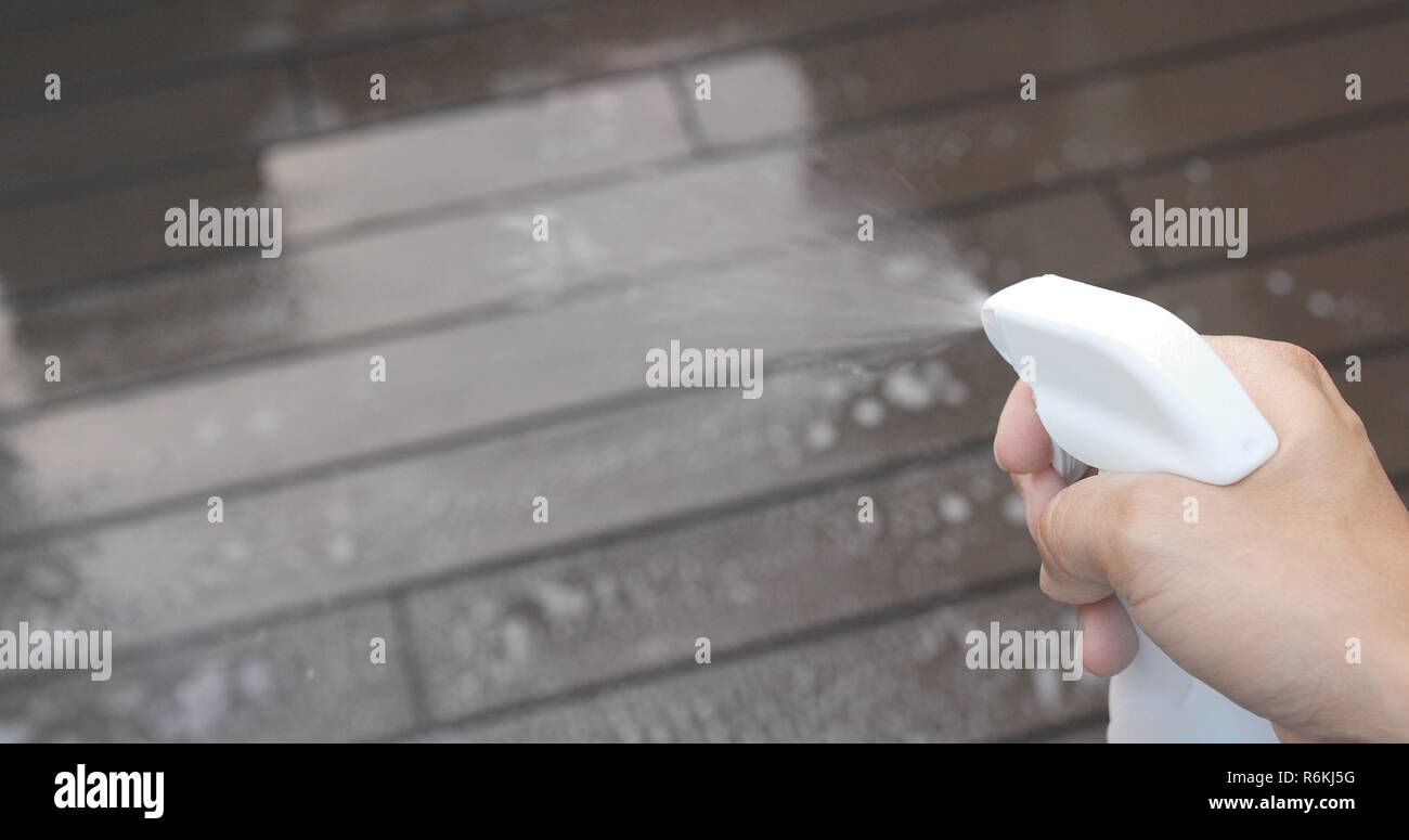 Detergent spray on floor Stock Photo - Alamy