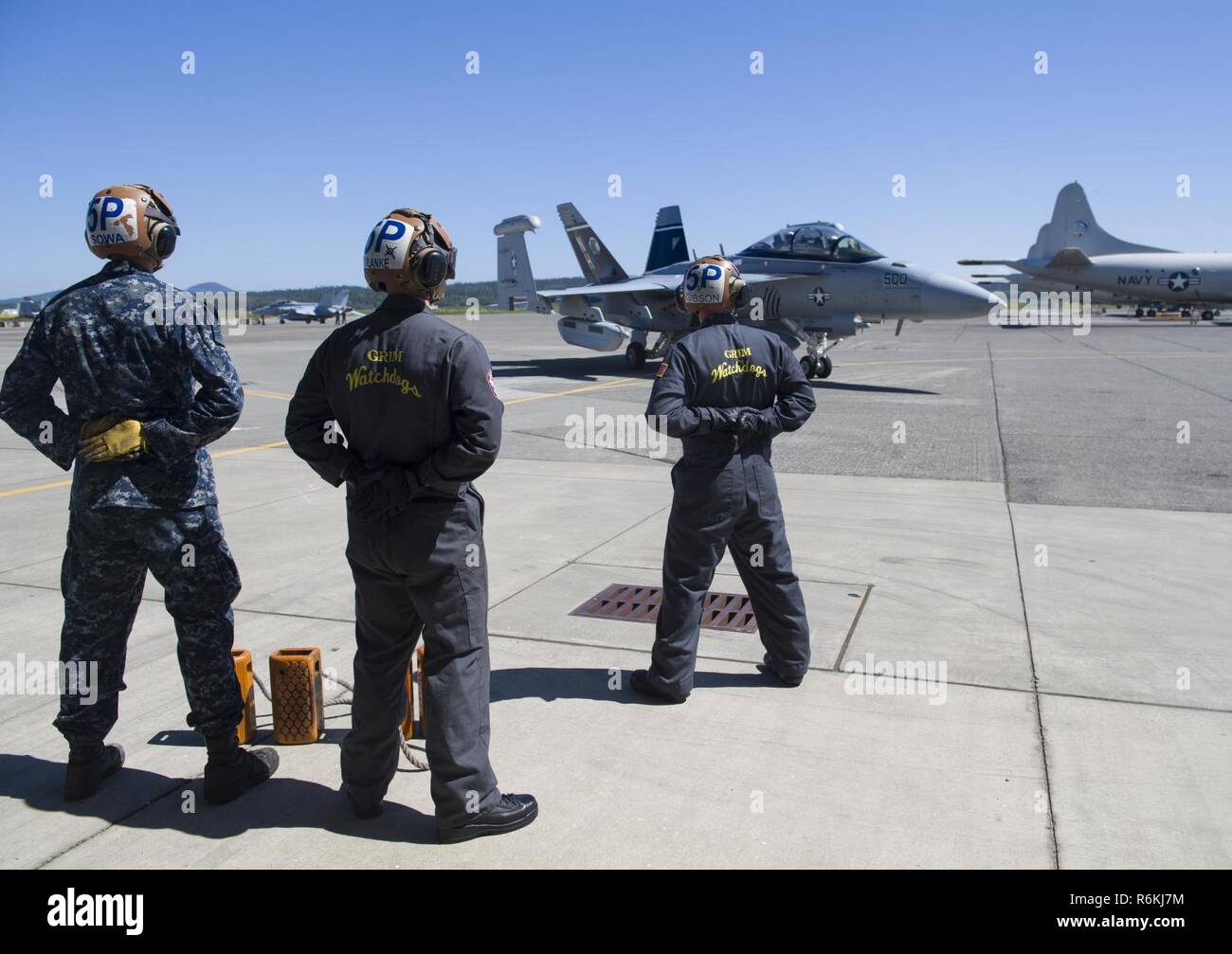 OAK HARBOR, Wash. (May 26, 2017) Sailors standby as an EA-18G Growler ...