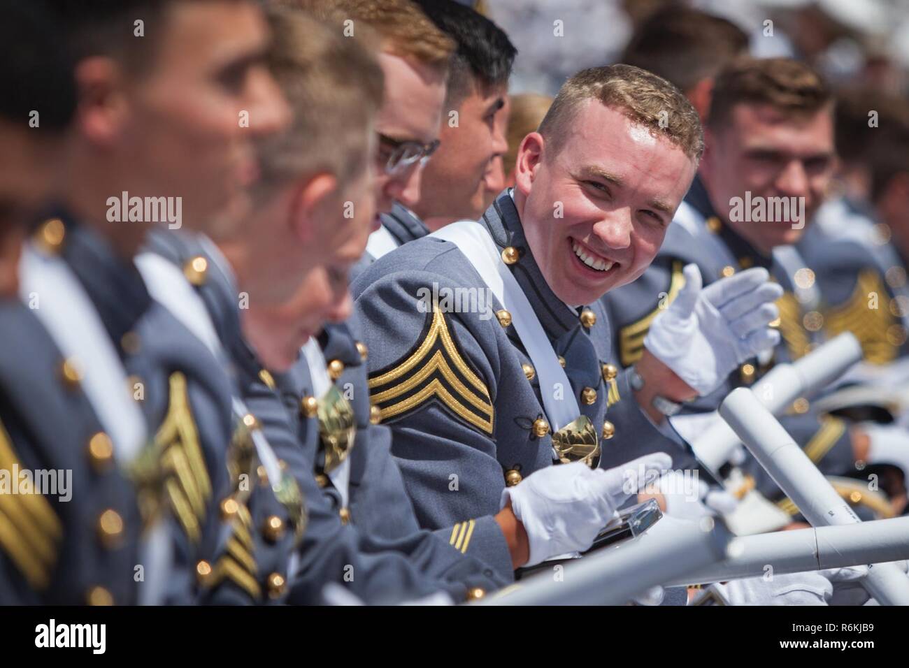U.S. Military Academy cadets celebrate receiving their diplomas during ...
