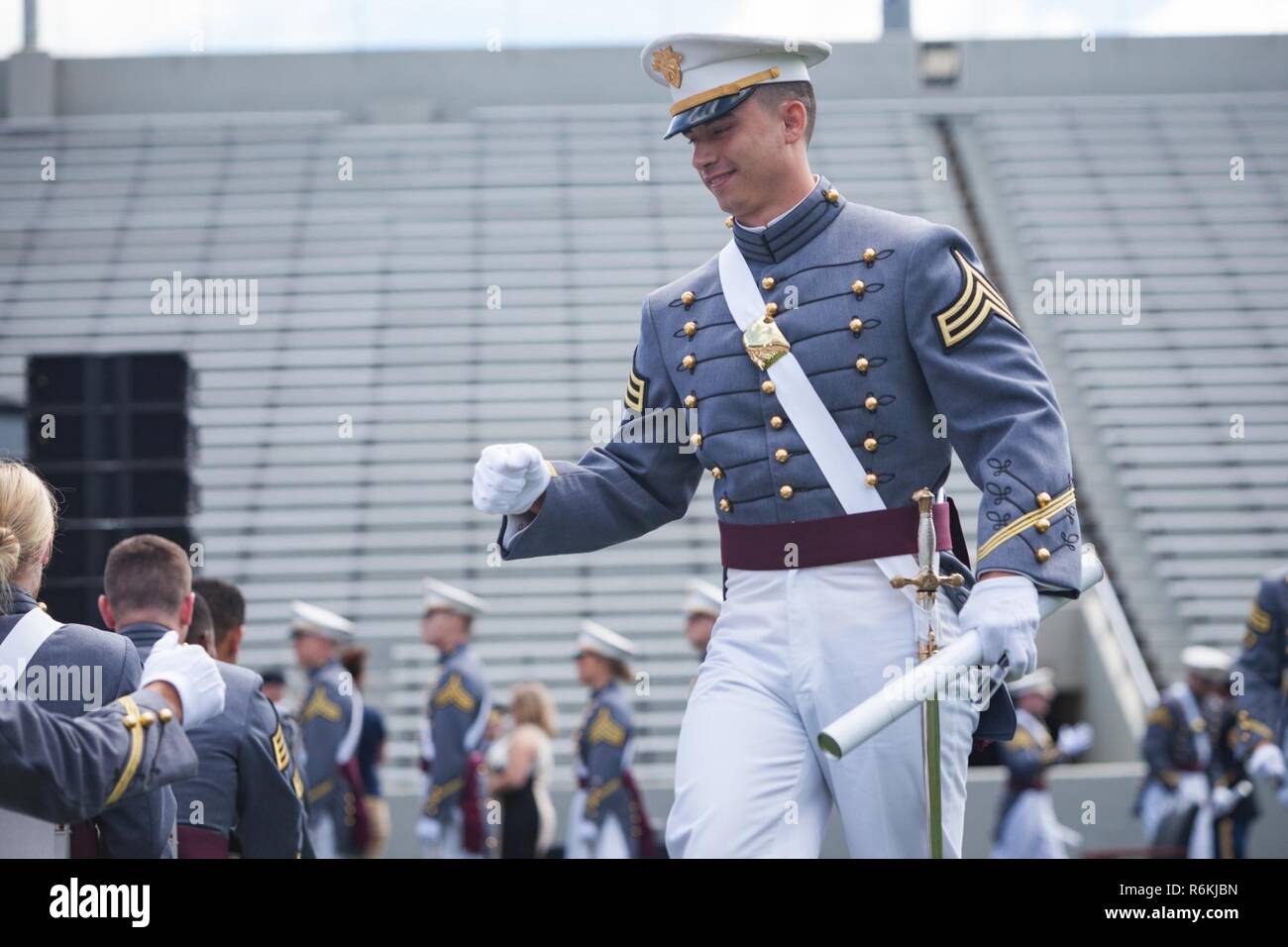 U.S. Military Academy cadets celebrate receiving their diplomas during ...