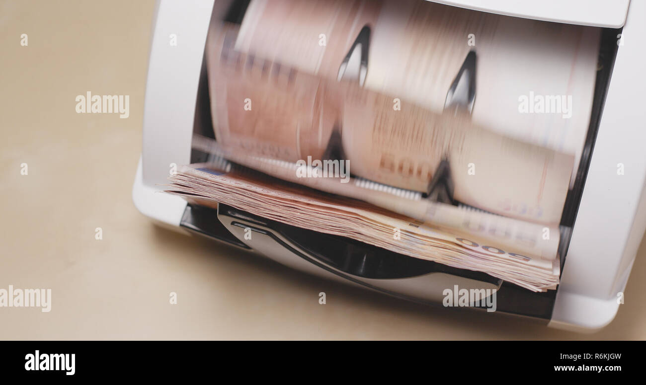 Cash money machine for counting Hong Kong dollar Stock Photo - Alamy