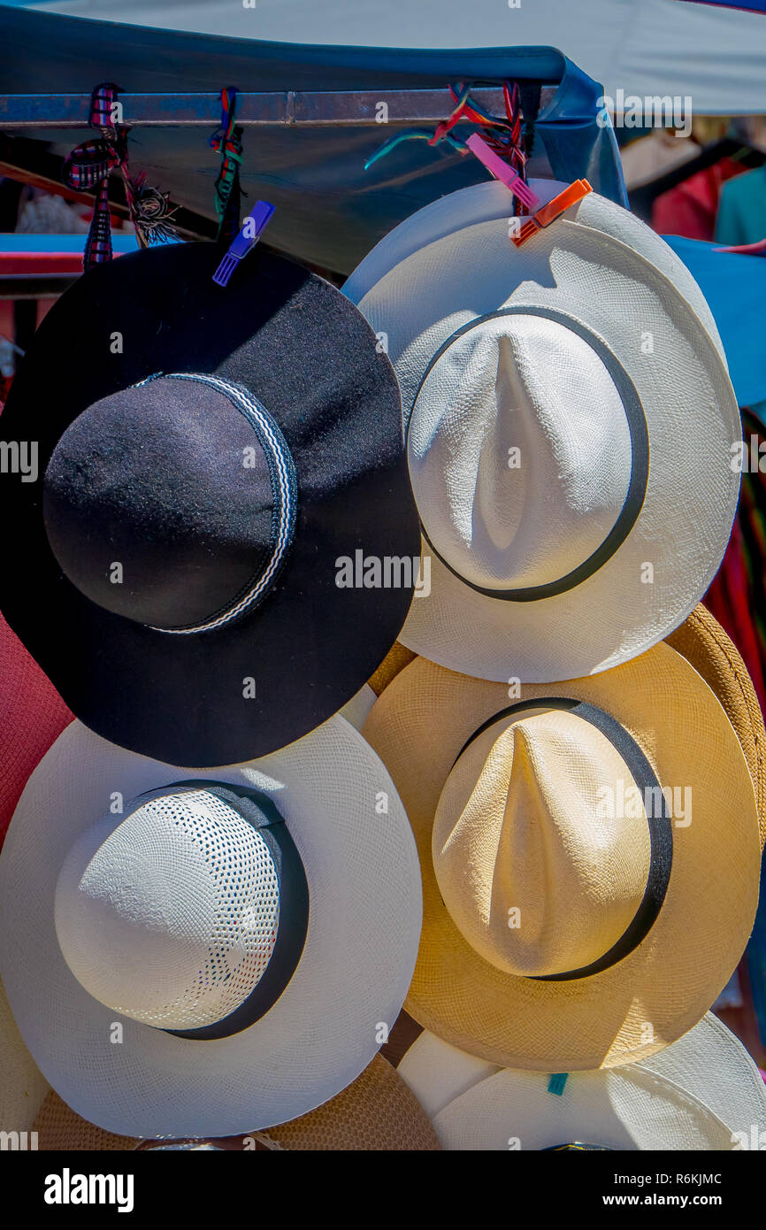 Outdoor view of market stall with panama hats in street market in ...