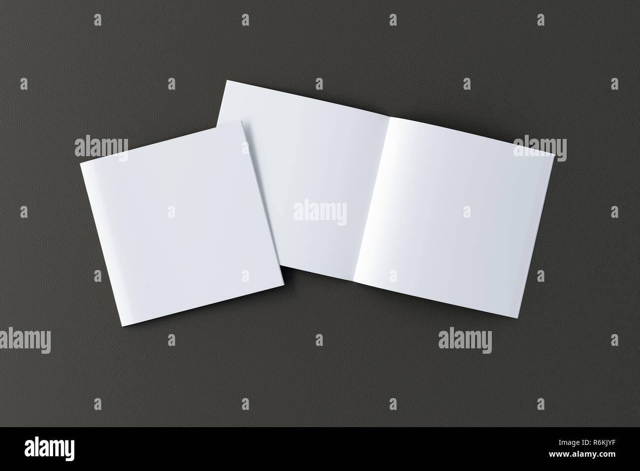 Open and closed square blank booklet on black background with clipping ...