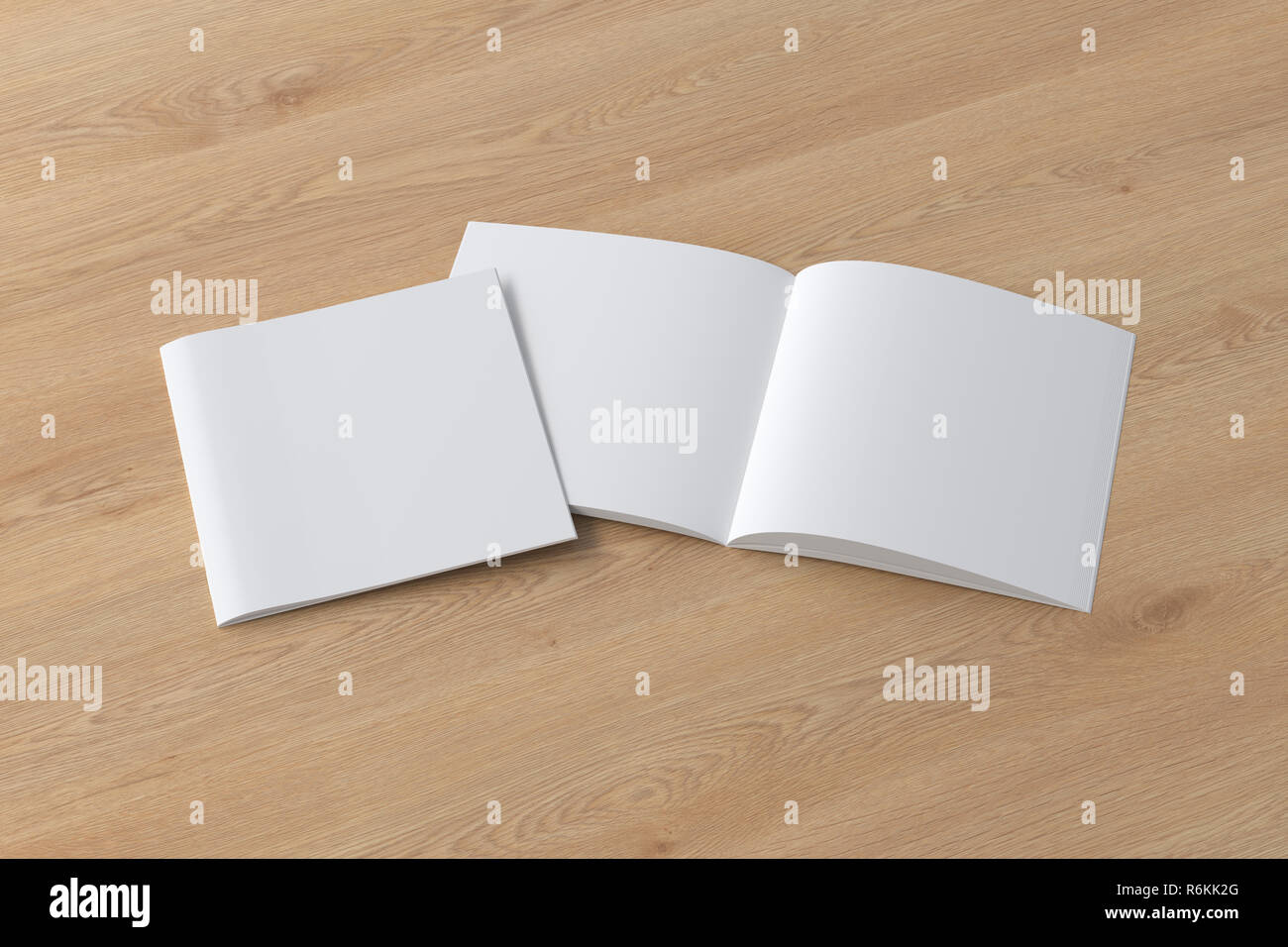 Open and closed square blank booklet on wooden background with clipping ...