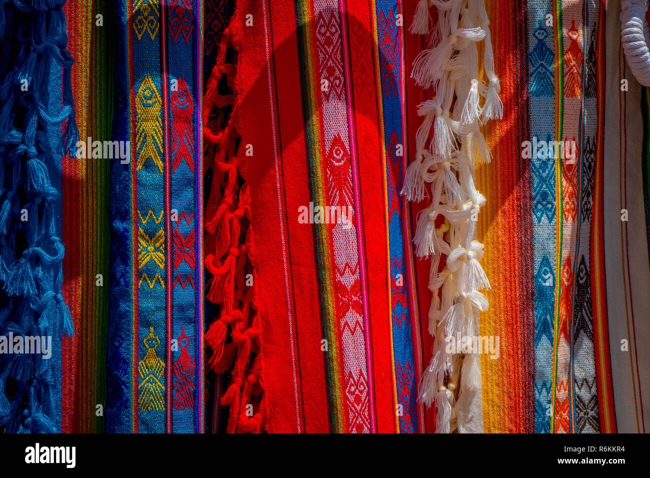 The typical andean fabrics sold on the handicrafts market of Otavalo ...