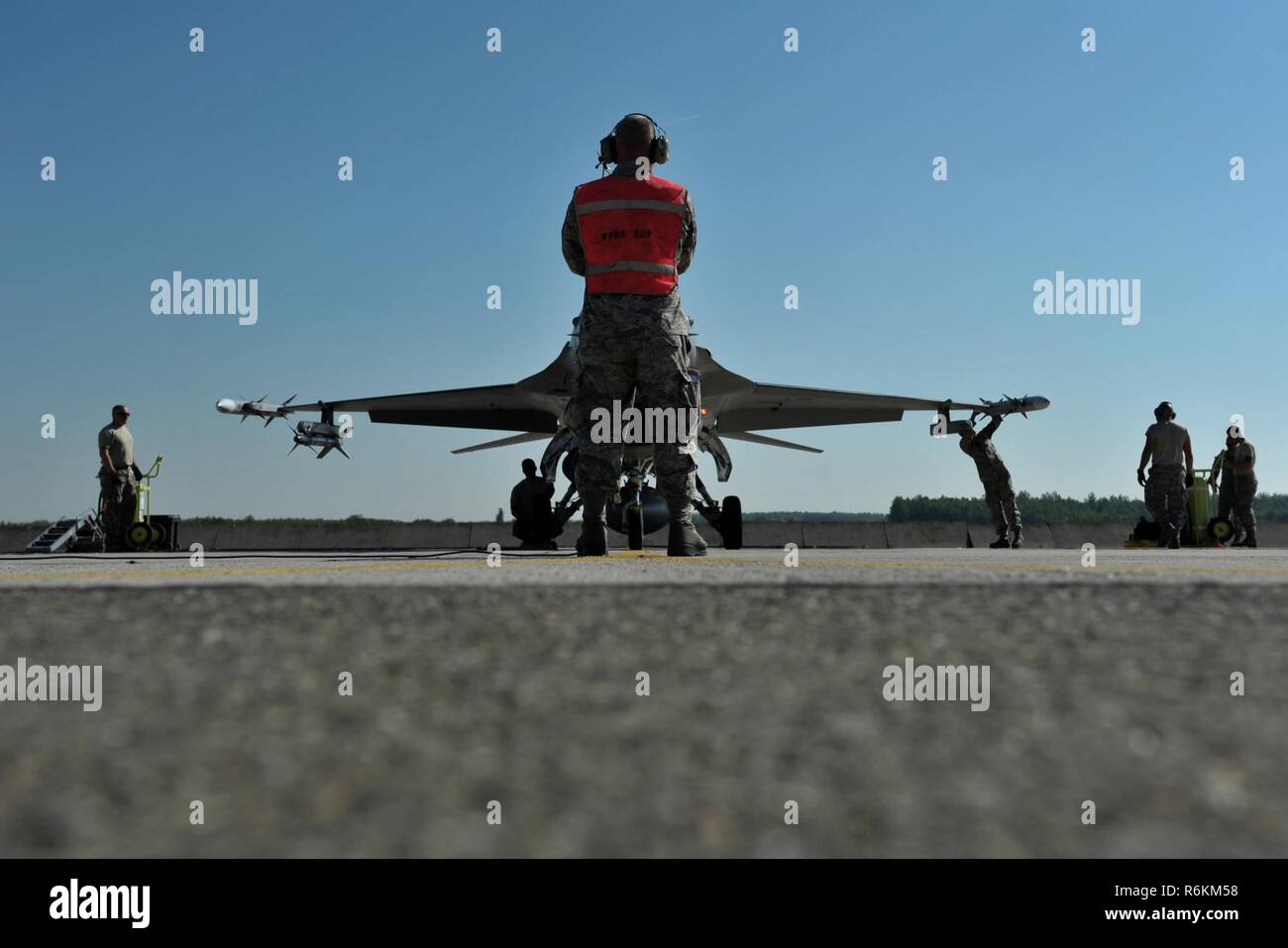 U.S. Air Force Master Sgt. Joe Ray, a weapons loader assigned to the ...