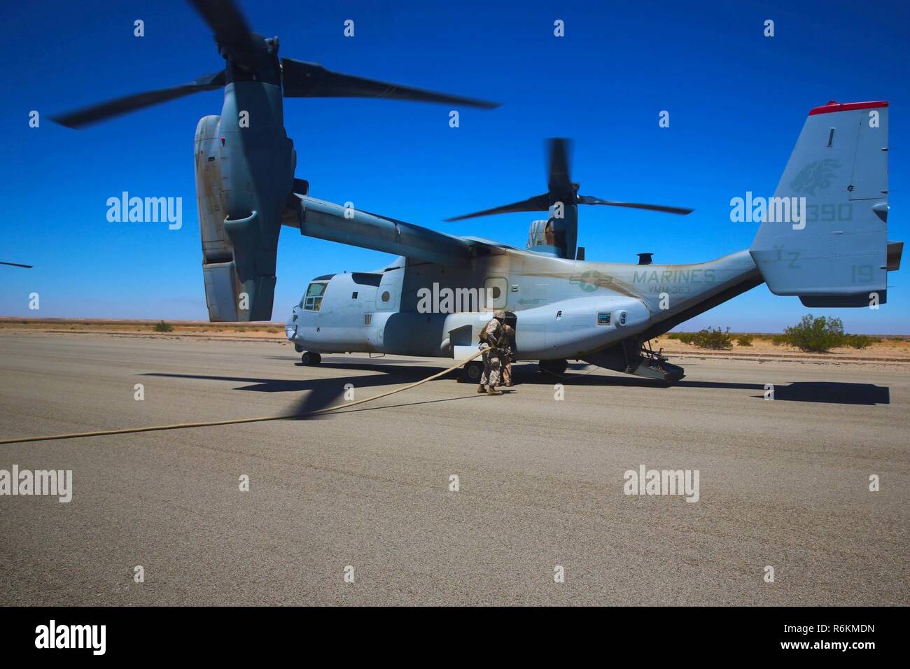 Marines with Marine Medium Tiltrotor Squadron (VMM) 363 refuel before ...
