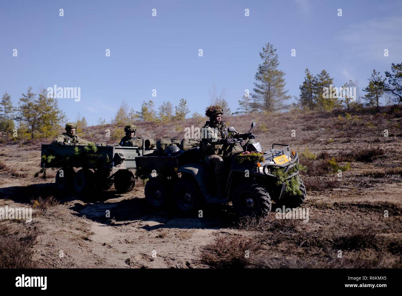 Finnish Soldiers of Armoured Brigade patrol the area, in Pohjankangas ...
