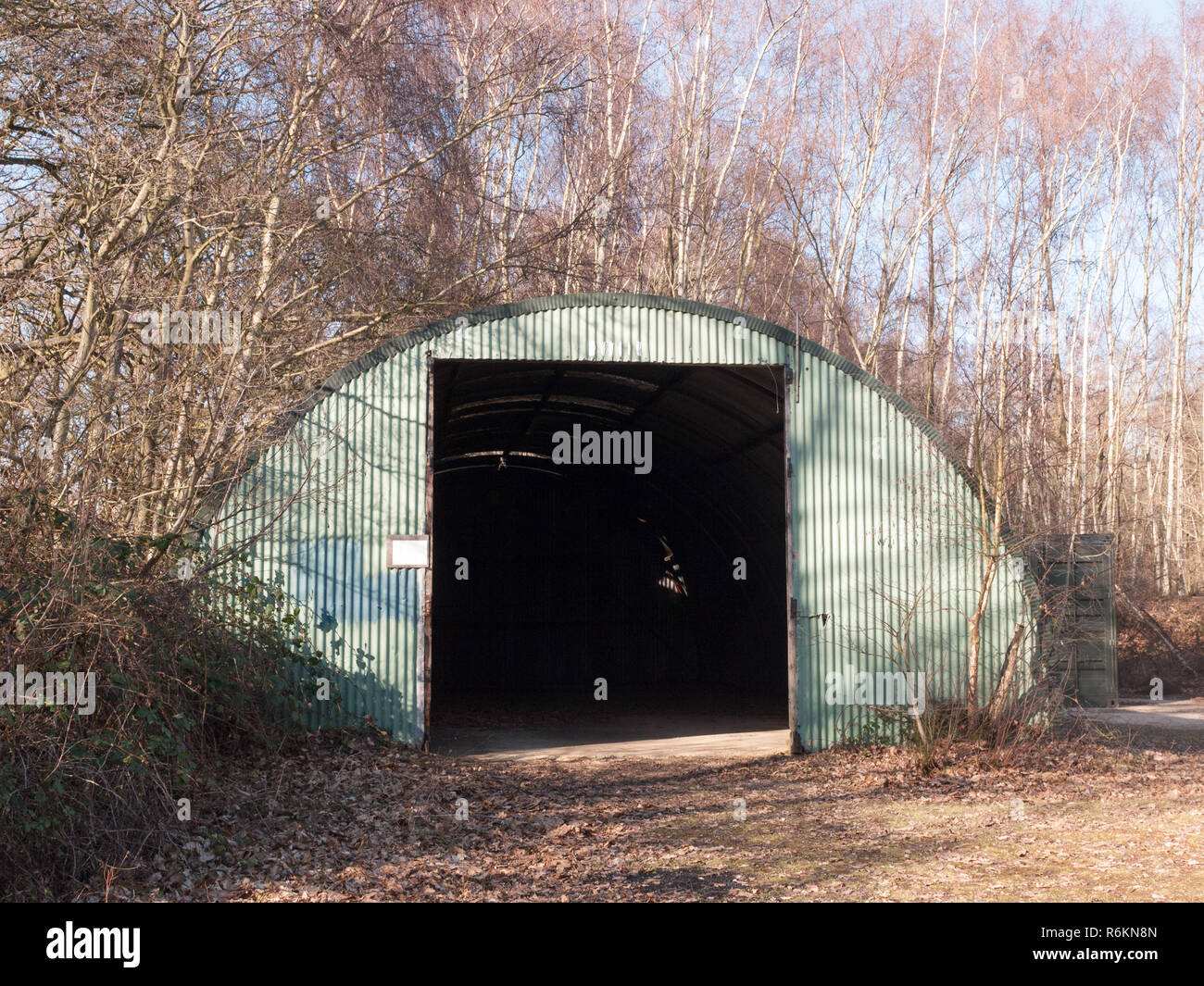 old unused bunker door way shed outside land Stock Photo - Alamy