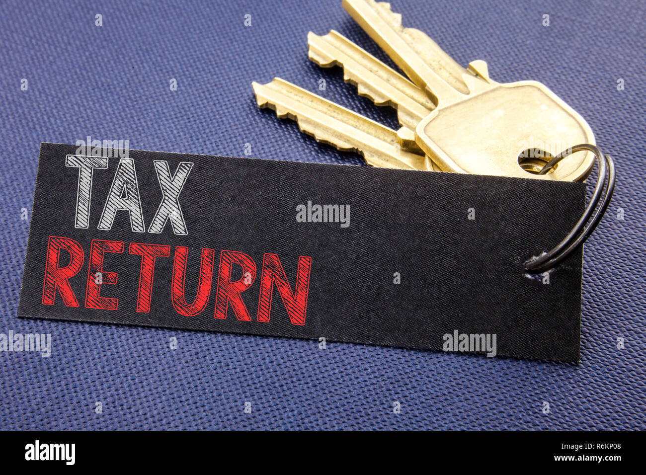 Handwritten text showing Tax Return. Business concept writing for ...