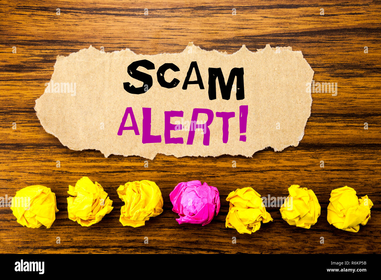 Handwriting text Scam Alert. Concept for Fraud Warning Written on ...