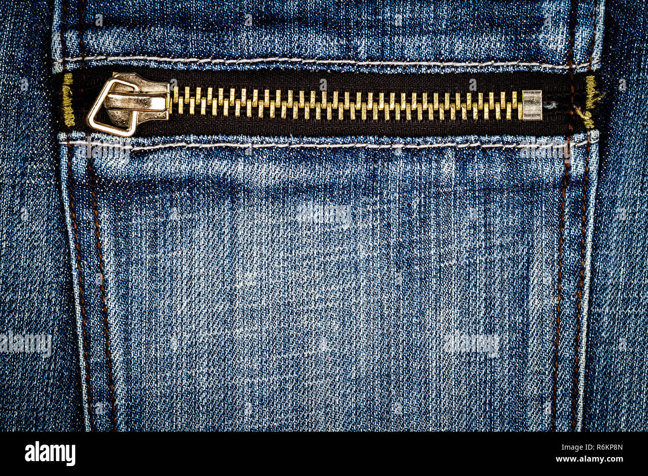 Worn blue denim jeans texture with back pocket and zipper. Abstract ...