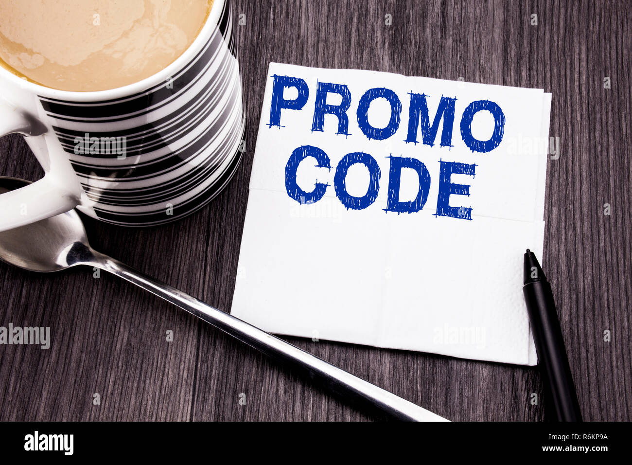 Handwritten text showing Promo Code. Business concept for Promotion for ...