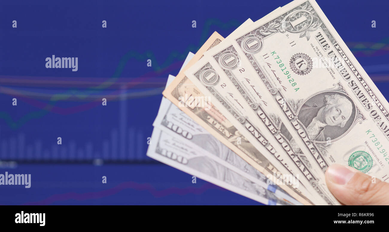 USD banknote over stock market screen background Stock Photo - Alamy