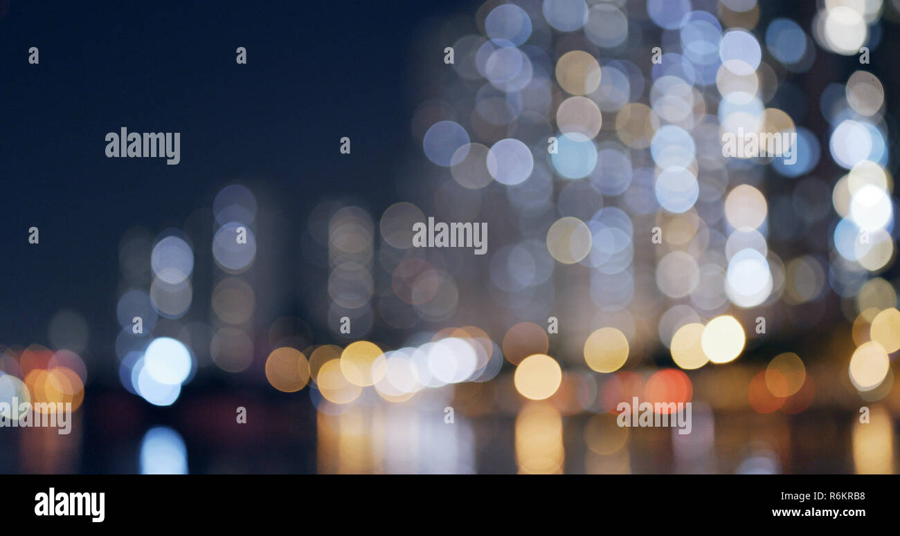 Building facade of blur at night Stock Photo - Alamy
